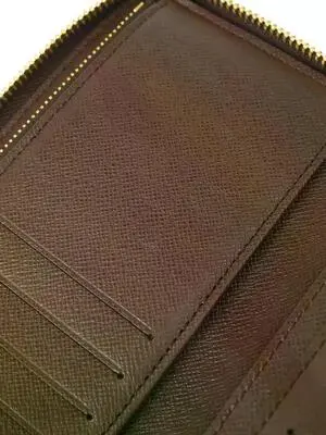 LOUIS VUITTON 2010 Damier Ebène Zippy Wallet