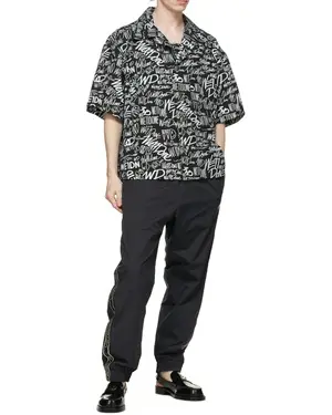 We11Done All-over Logo Print Short-sleeved Shirt