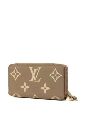 LOUIS VUITTON 2010-2026 Bicolor Monogram Empreinte Giant Zippy Wallet Long Wallets