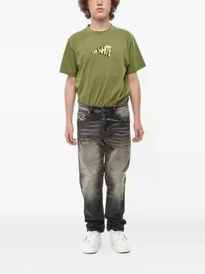 DIESEL® D-definitive Distressed Tapered Leg Jeans