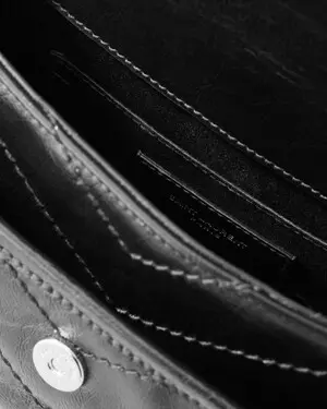 Saint Laurent Niki Baby In Vintage Leather With Chain Strap - Black