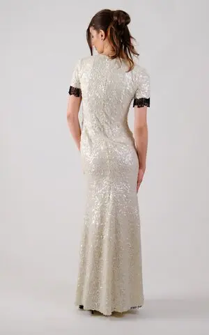 SALMA OSMAN Sequined Embellished Maxi Dress With Bow And Fringe Detail