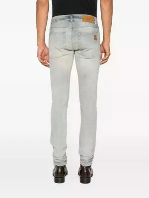Amiri Stud-embellished Distressed Jeans