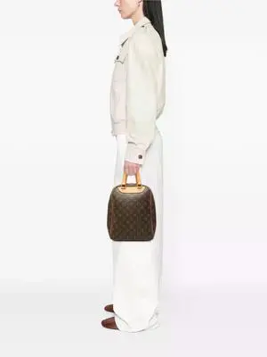 LOUIS VUITTON Monogram Excursion Handbag