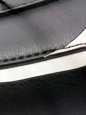 Valentino Garavani Vlogo Leather Messenger Bag