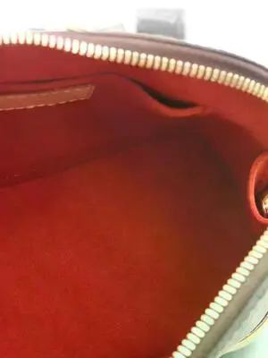 LOUIS VUITTON Monogram Alma Backpack - Brown