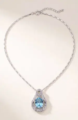 MODENAIRE Teardrop Crystal Pendant Necklace - Light Sapphire