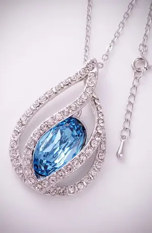 MODENAIRE Crystal Orb Cage Pendant Necklace
