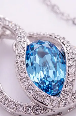 MODENAIRE Crystal Orb Cage Pendant Necklace