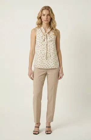 MODENAIRE Sleeveless Tie Neck Polka Dot Blouse
