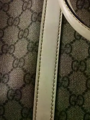 Gucci Gg Coated Canvas Medium Satchel - Neutrals