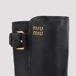 Miu Miu Leather Knee-high Buckled Lug Sole Boots - Black
