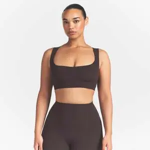 SKIMS Racerback Bra | Deep Neutral | | Nike Studio Stretch - Dark Roast