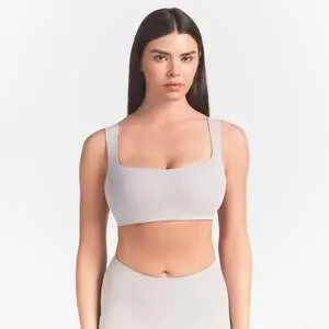 SKIMS Racerback Bra | White | | Nike Studio Stretch