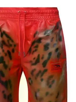 LA MASKARADE Animal-print Leather Track Pants