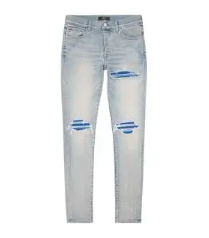 Amiri Ripped Mx1 Ultrasuede Skinny Jeans - Blue