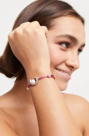 UNODE50 Mauve Thread Bracelet With Pearl Shell Trimmings Plated