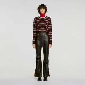 Sandro Distressed Leather Flared Trousers With Hem Slits