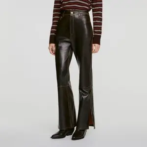 Sandro Distressed Leather Flared Trousers With Hem Slits