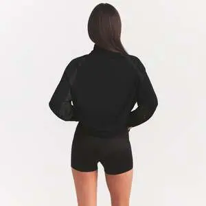 SKIMS Long Sleeve Half Zip | Black | | Nike Stretch Knit