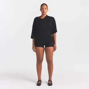 SKIMS Oversized V Neck Top | Black | | Nike Stretch Knit