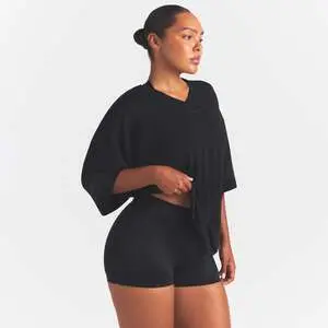 SKIMS Oversized V Neck Top | Black | | Nike Stretch Knit