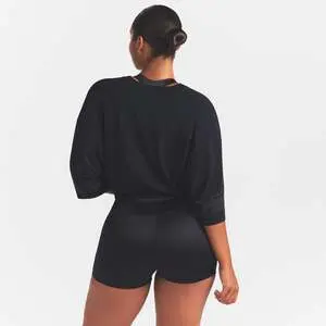 SKIMS Oversized V Neck Top | Black | | Nike Stretch Knit