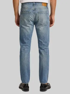 Saint Laurent Tapered Mid-rise Jeans