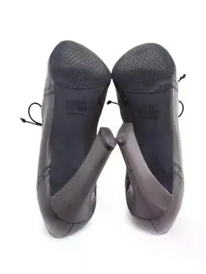 STUART WEITZMAN Lace-up Wingtip Pumps