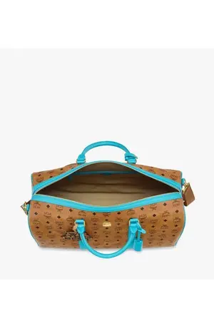 Mcm X We The Best Ottomar Weekender Bag In Visetos