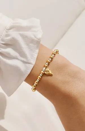 A LITTLES & CO Follow Your Heart' Beaded Bracelet With Charm