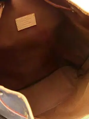LOUIS VUITTON Monogram Canvas Backpack