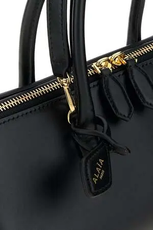 Alaïa Leather Small Delta Handbag