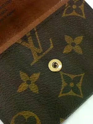LOUIS VUITTON 2010 Porte Monnaie Plat Monogram Coin Case
