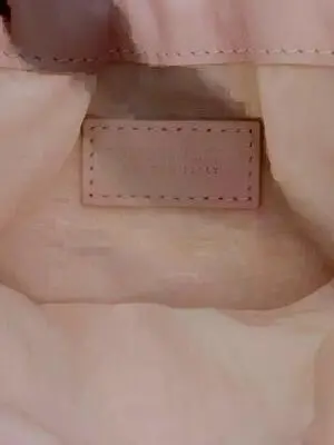 Bottega Veneta Small Nappa Intrecciato Drawstring Crossbody Bag - Pink