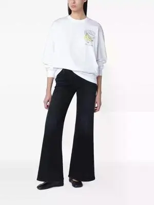 MOTHER The Roller Sneak Jeans