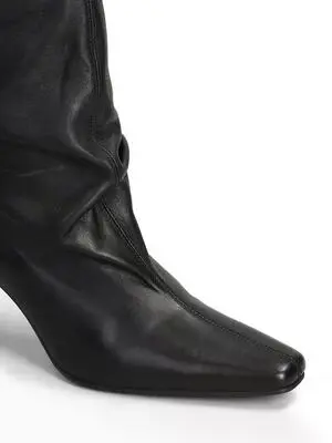 THE SELLER Slouchy Pointed-toe Leather Ankle Boots - Black