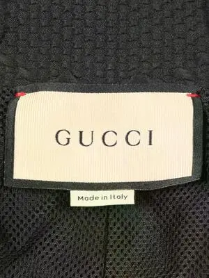 Gucci Gg Embossed High Neck Zip-up Jacket