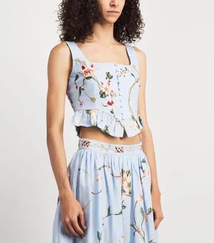 Agua Bendita Linen Floral Embroidered Peplum Corset Top