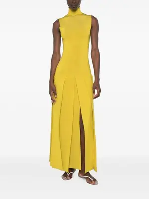 Alaïa High Neck Sleeveless Maxi Dress With Pleated Skirt And Side Slit
