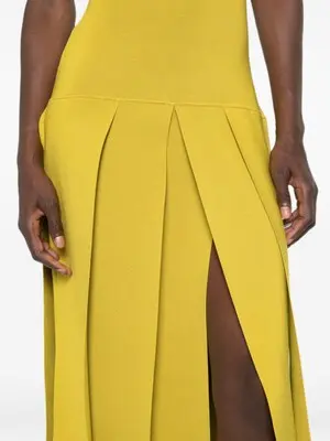 Alaïa High Neck Sleeveless Maxi Dress With Pleated Skirt And Side Slit
