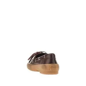 Miu Miu Leather Boat Shoes With Embossed Logo