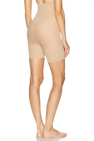 SKIMS Sheer Seamless High Waisted Mid Thigh Short In Nude - Clay