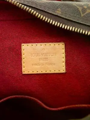 LOUIS VUITTON Monogram Excentri Cite Handbag
