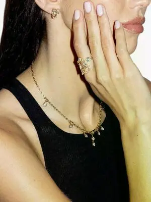 UNIFORM OBJECT Metal Web Earrings
