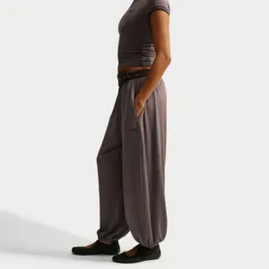 Nike Stretch Knit Flowy Pants With Cuffed Ankles