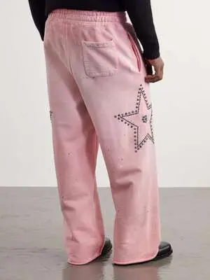 SATOSHI NAKAMOTO Wide-leg Studded Cotton-jersey Sweatpants
