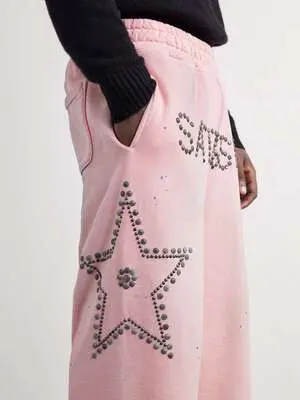 SATOSHI NAKAMOTO Wide-leg Studded Cotton-jersey Sweatpants