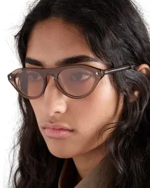 Prada Sunglasses With Iconic Metal Plaque