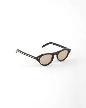 Prada Sunglasses With The Iconic Metal Plaque